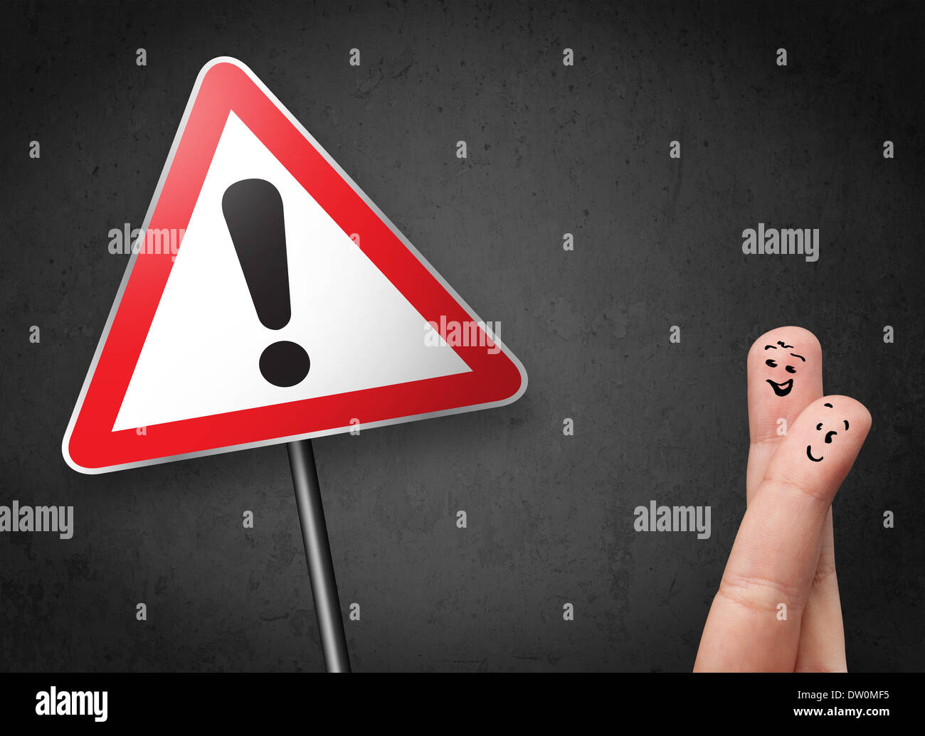 Happy smiley fingers looking at triangle warning sign with exclamation ...