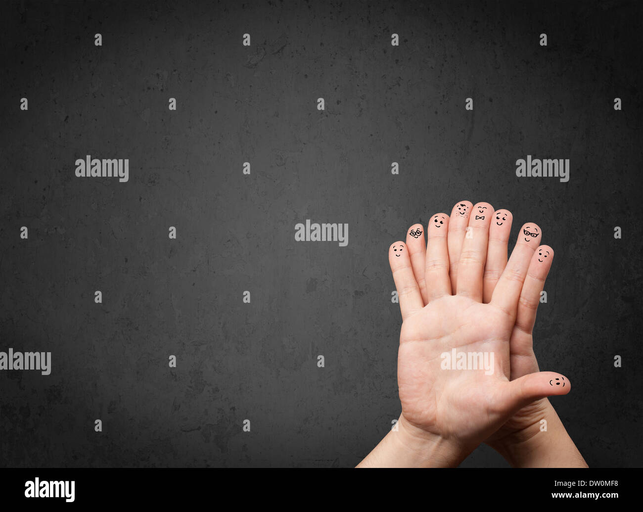 Happy finger smileys with empty copy space dark background Stock Photo ...