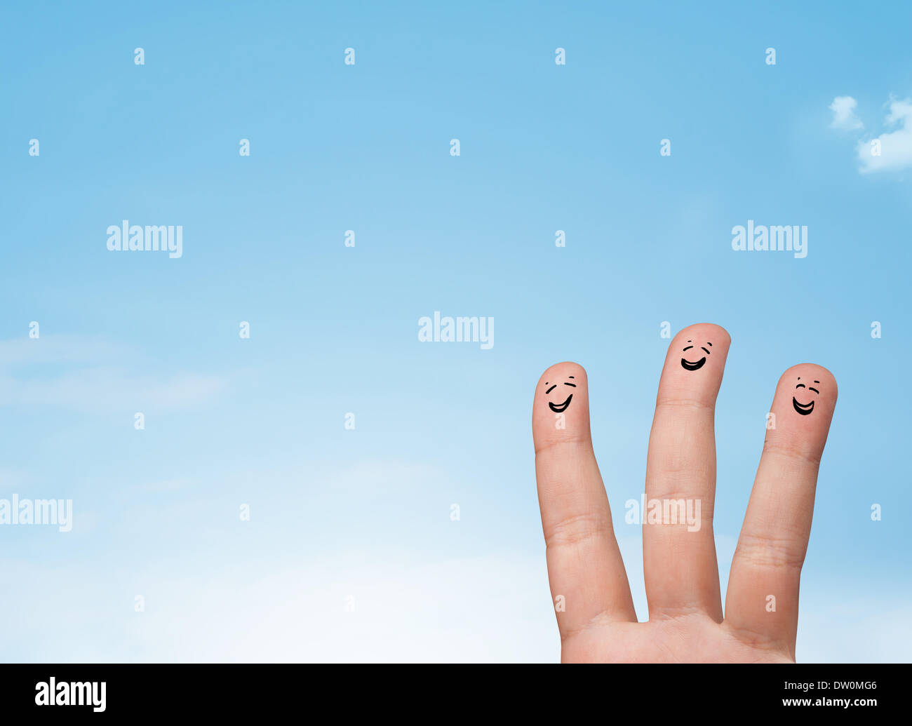 Happy smiley fingers looking at clear blue sky copyspace Stock Photo ...