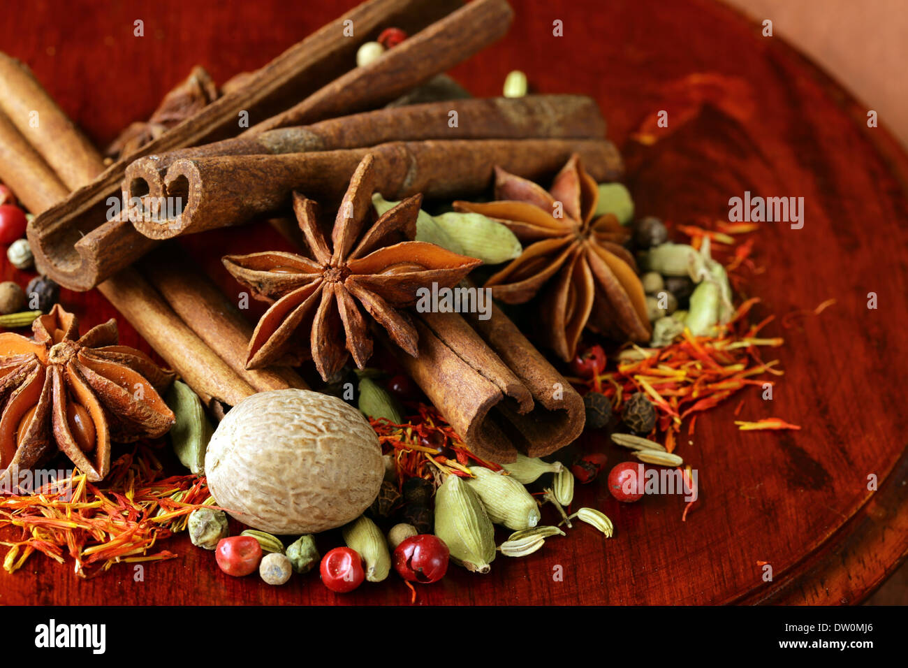 various spices (nutmeg, cinnamon, star anise, saffron, pepper, cardamom ...