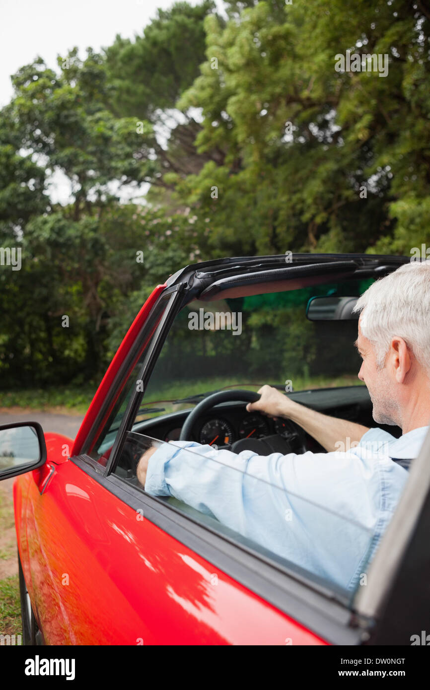 Man driving red sports car hi-res stock photography and images - Alamy