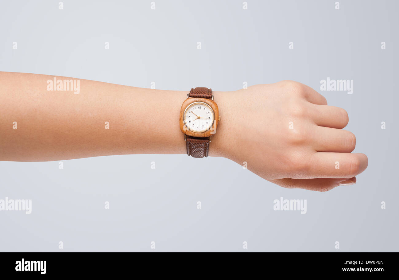 Hand with watch showing precise time Stock Photo - Alamy