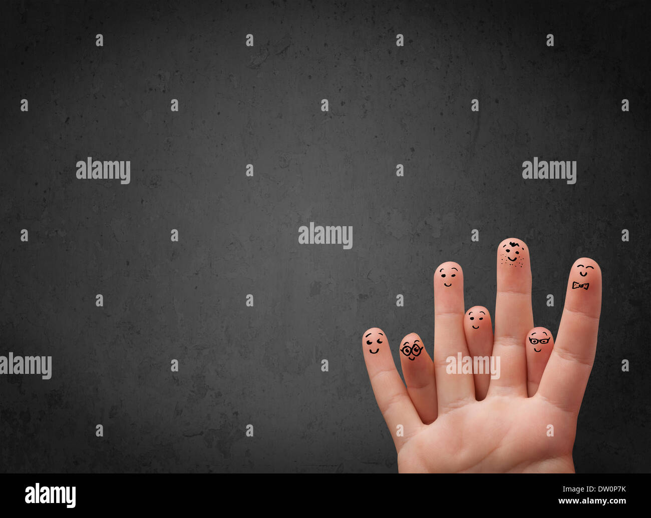 Happy finger smileys with empty copy space dark background Stock Photo ...