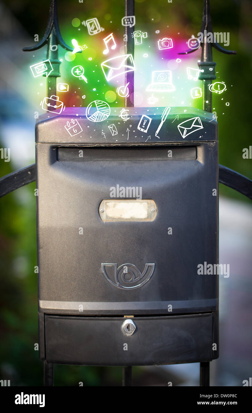Colorful icons and symbols bursting out of a mailbox Stock Photo - Alamy