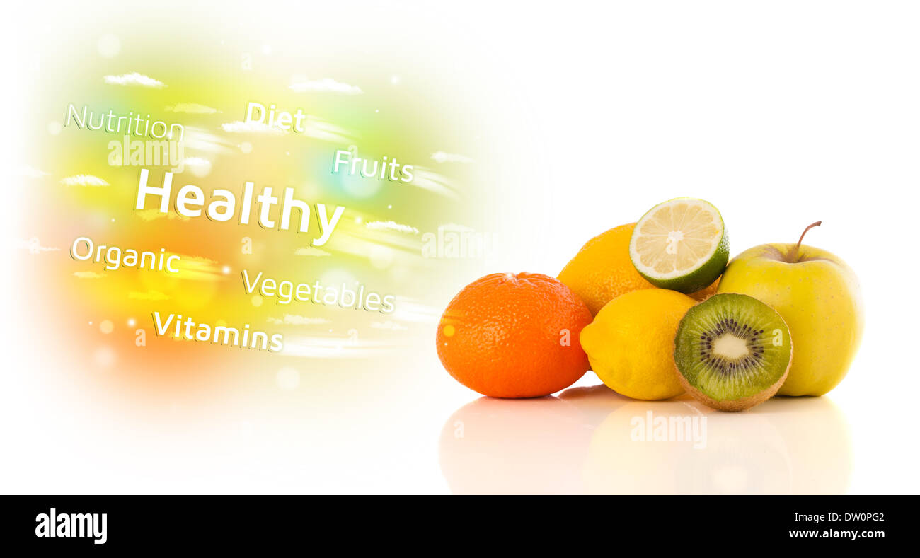 Colorful juicy fruits with healthy text and signs Stock Photo - Alamy