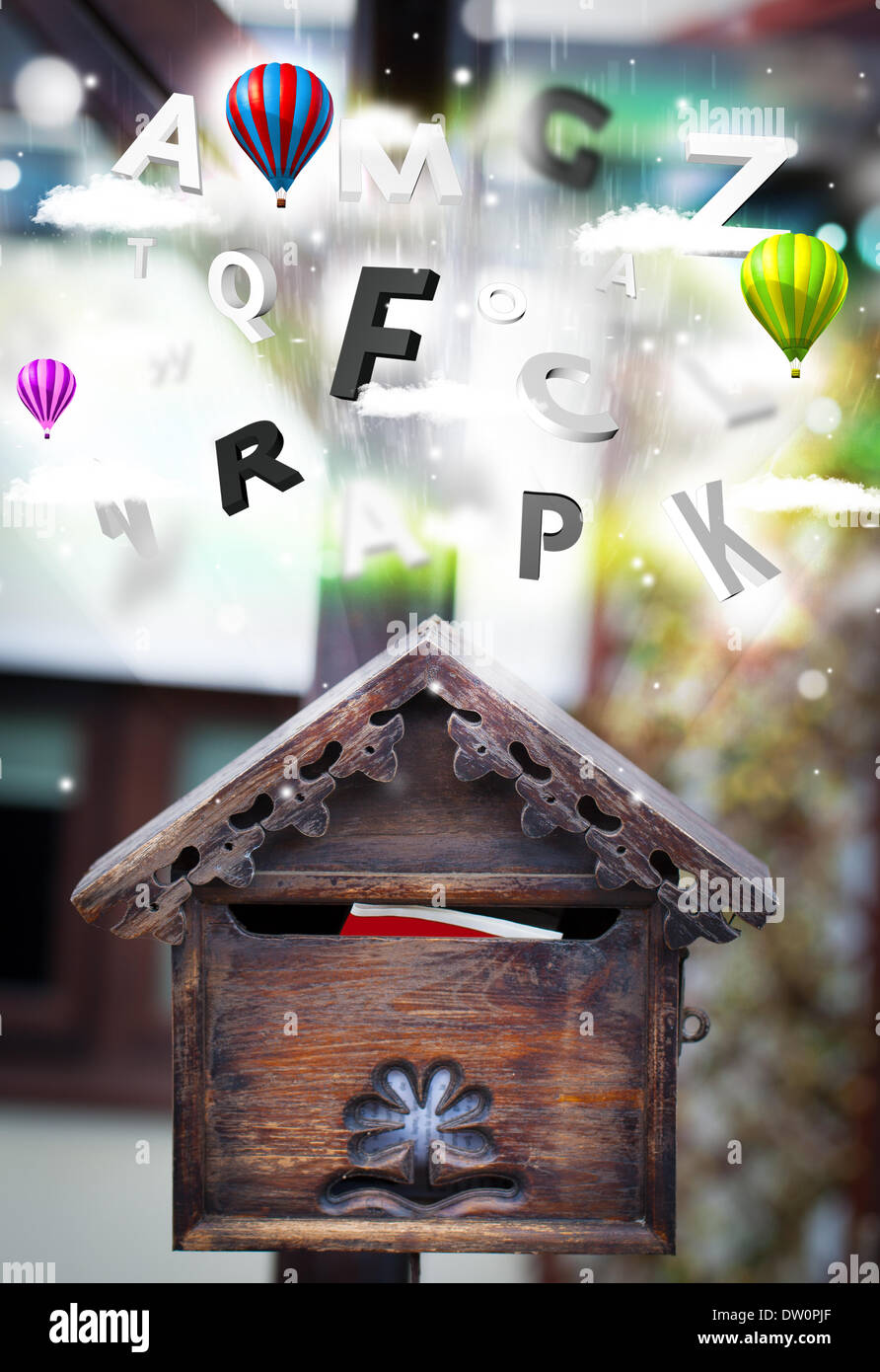 Post box with colorful letters Stock Photo - Alamy