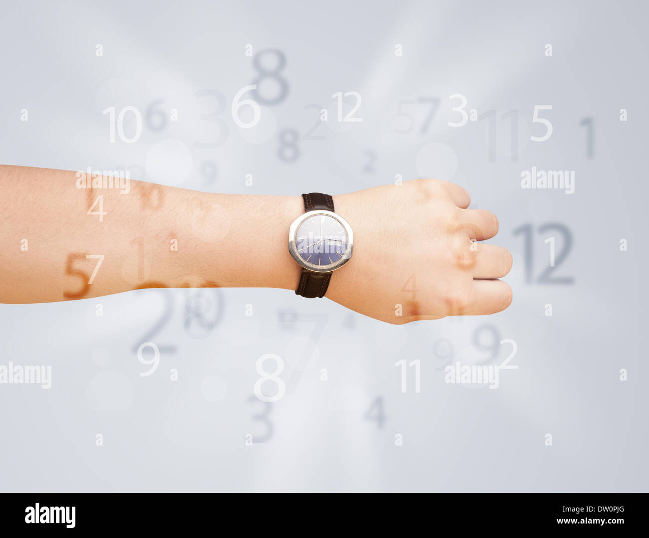 Hand with watch and numbers on the side comming out Stock Photo - Alamy