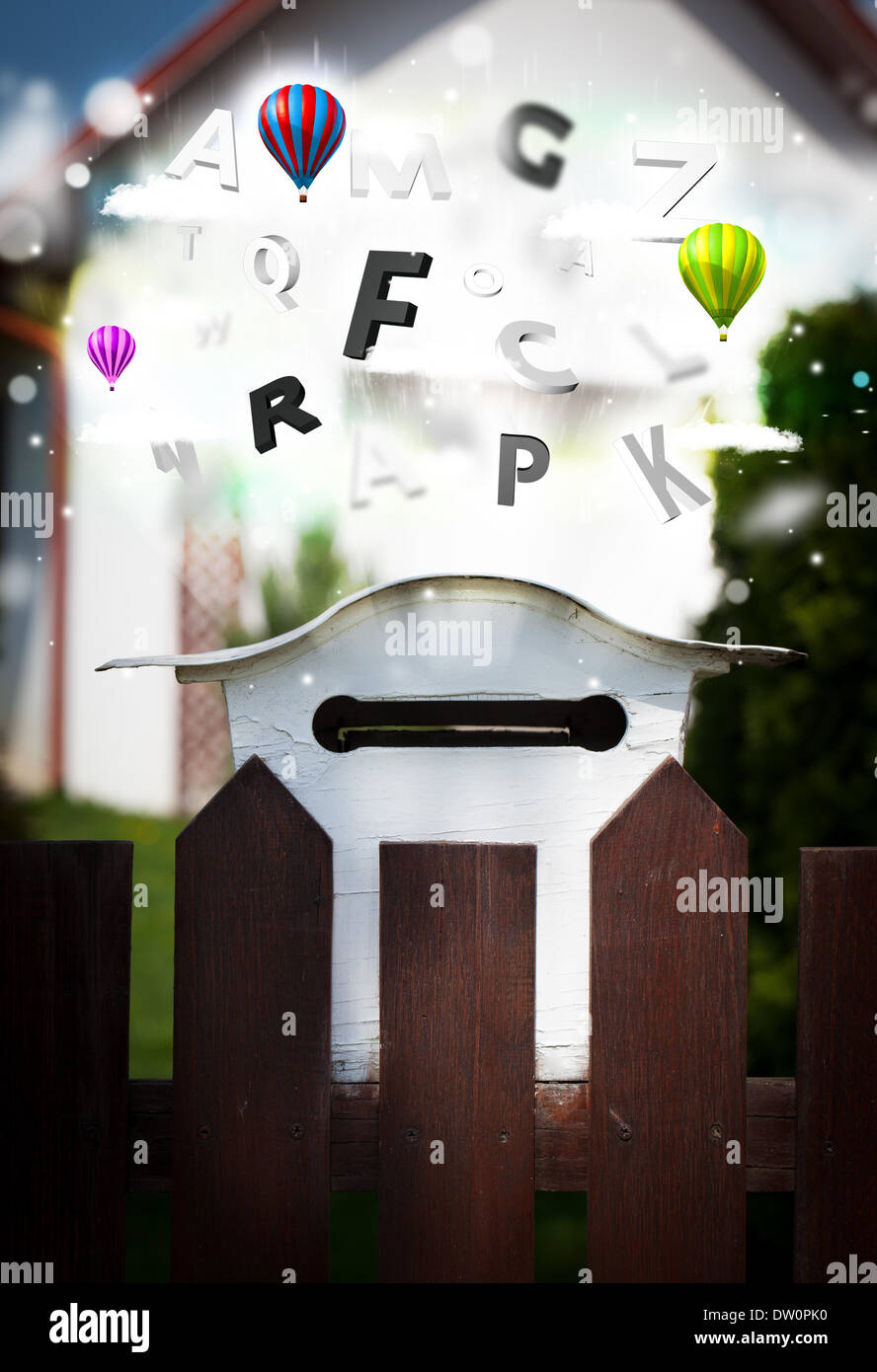 Post box with colorful letters Stock Photo - Alamy