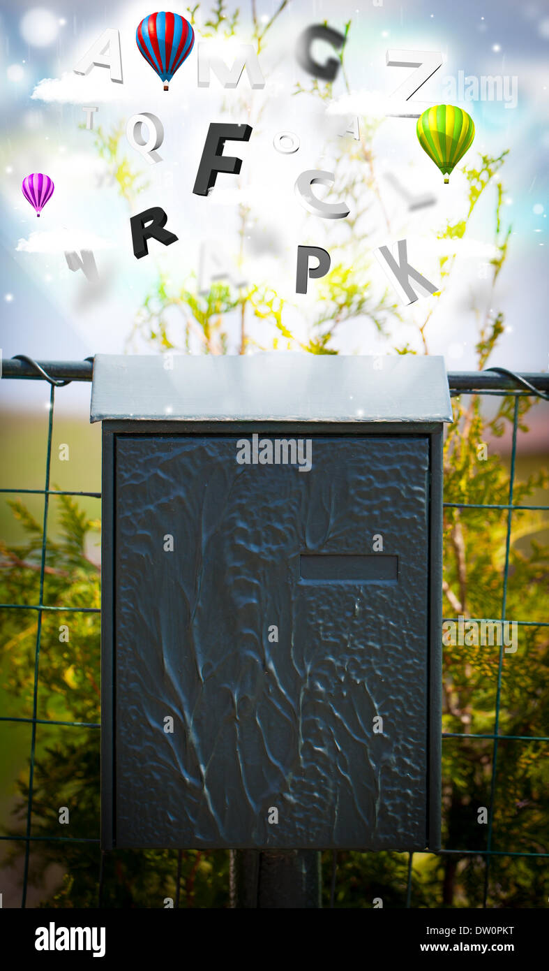 Post box with colorful letters Stock Photo - Alamy