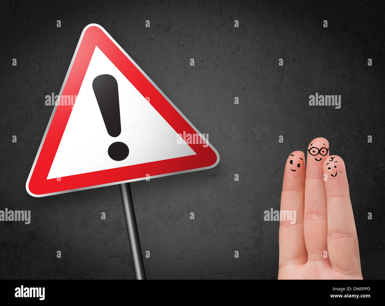 Happy smiley fingers looking at triangle warning sign with exclamation ...