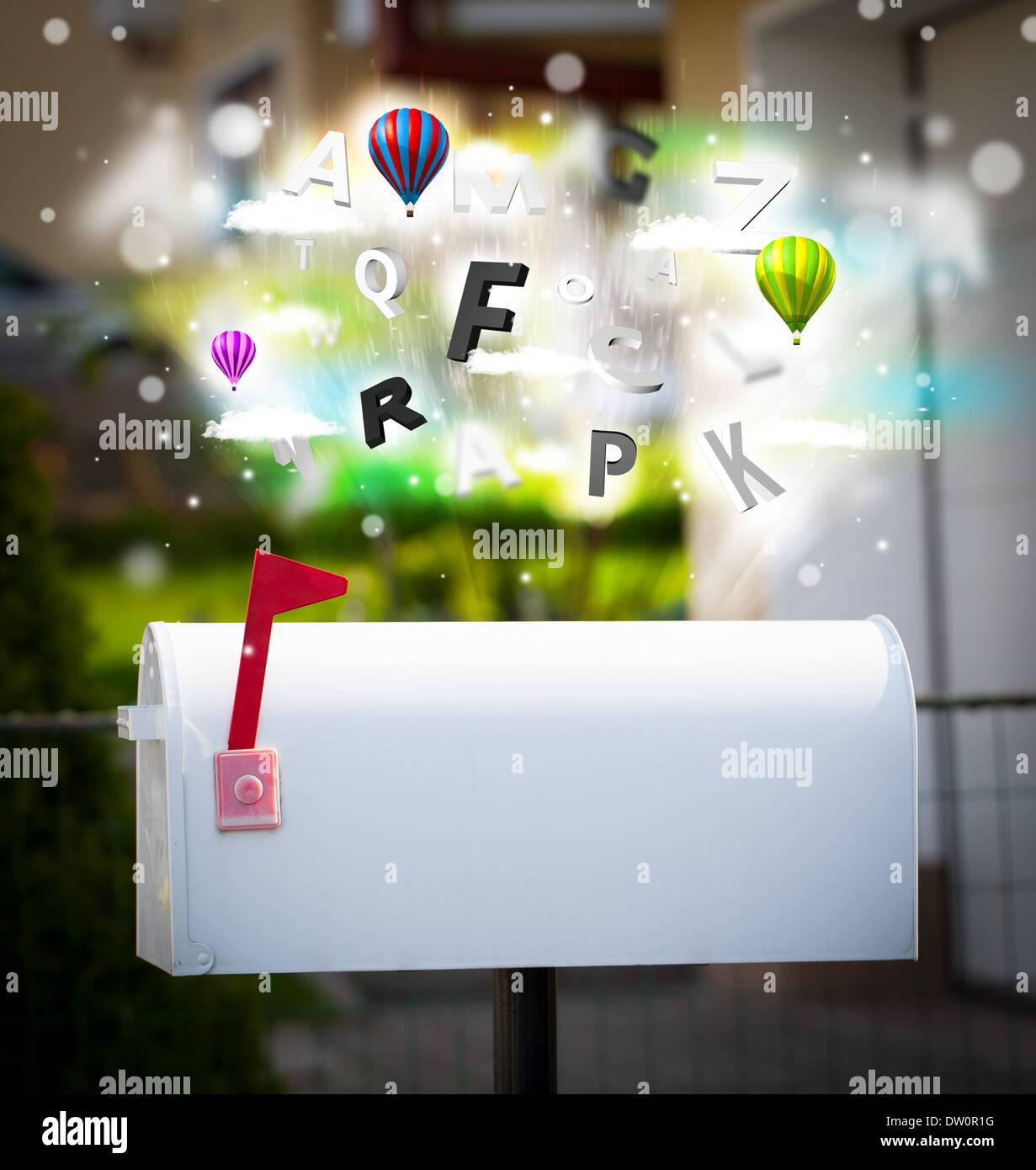 Post box with colorful letters Stock Photo - Alamy