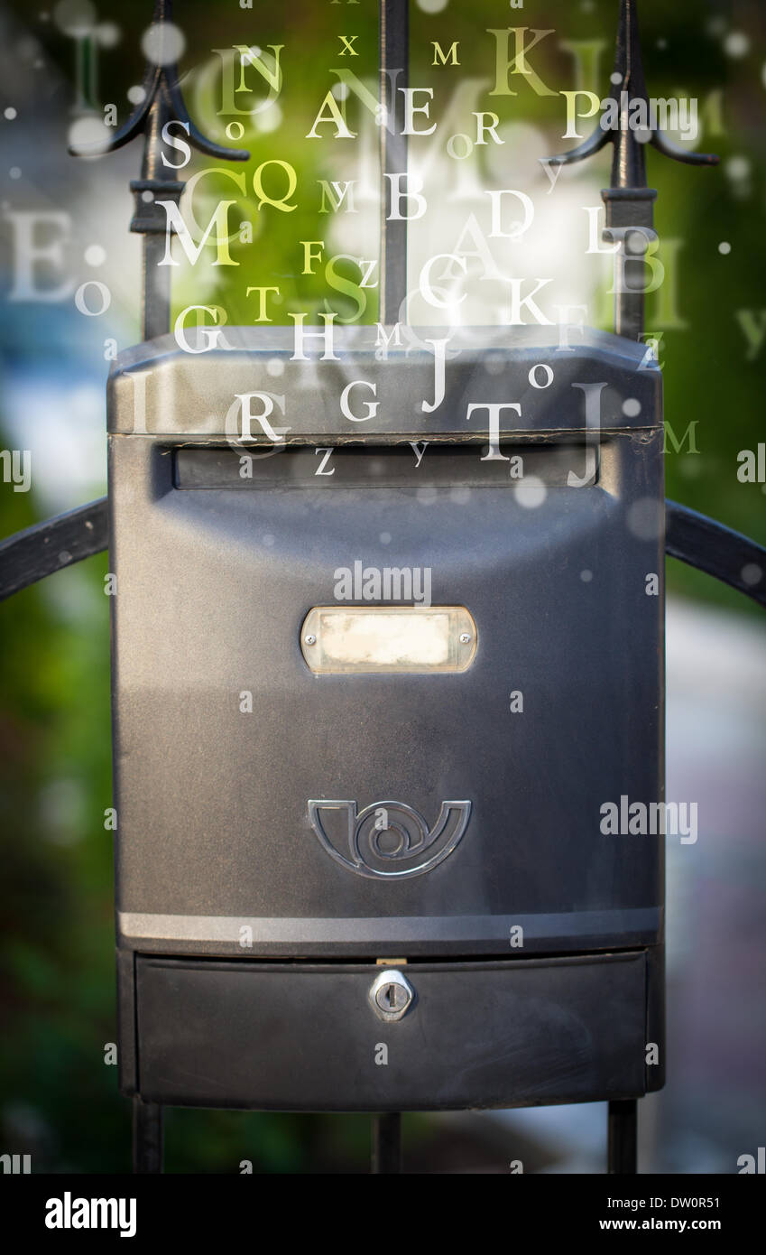 Mail box with letters comming out Stock Photo - Alamy