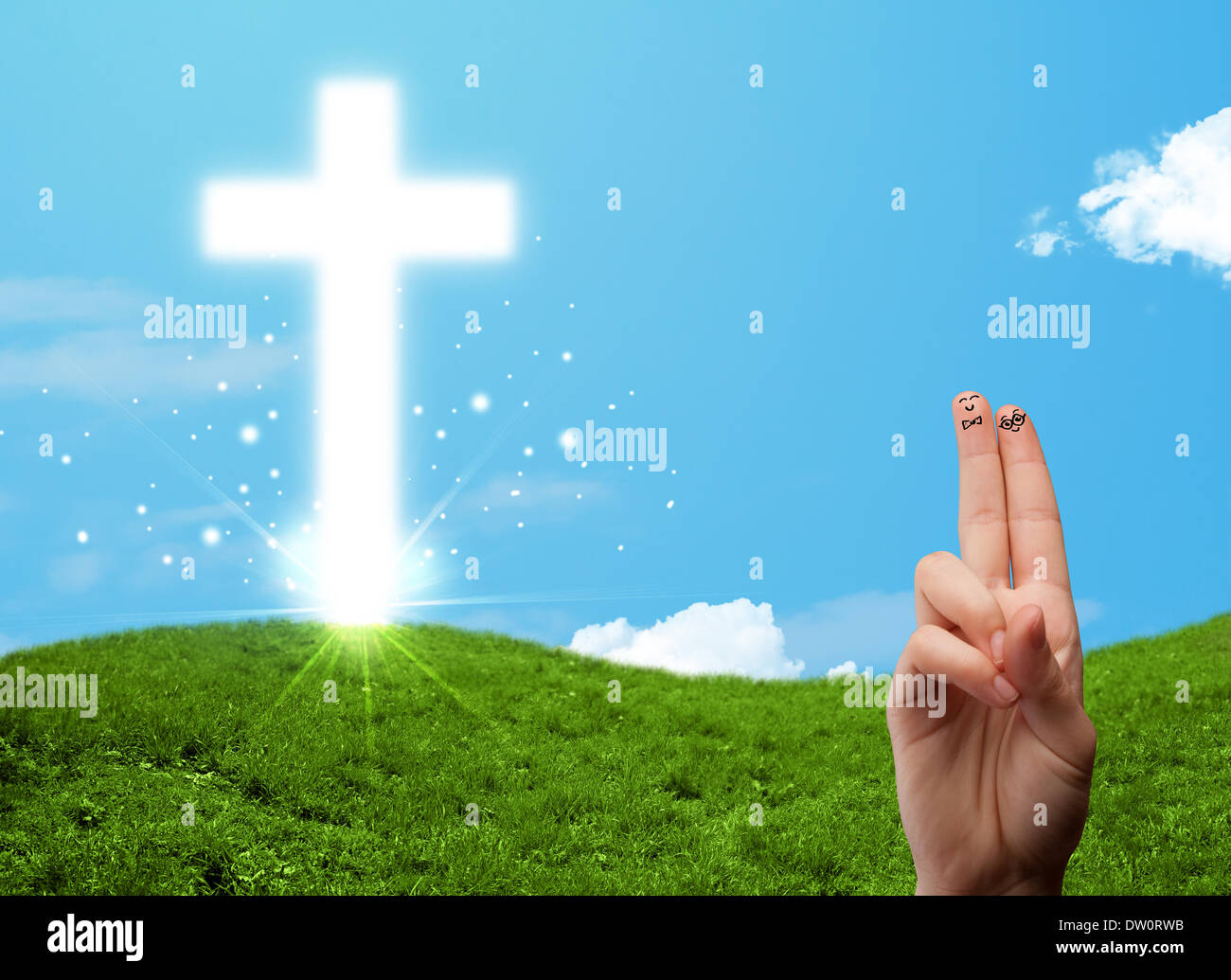 Happy finger smileys with christian religion cross Stock Photo - Alamy