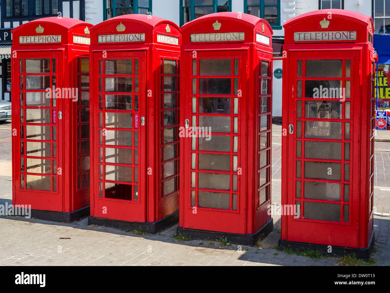 Row of traditional red telephone boxes in the historic old Market Place ...