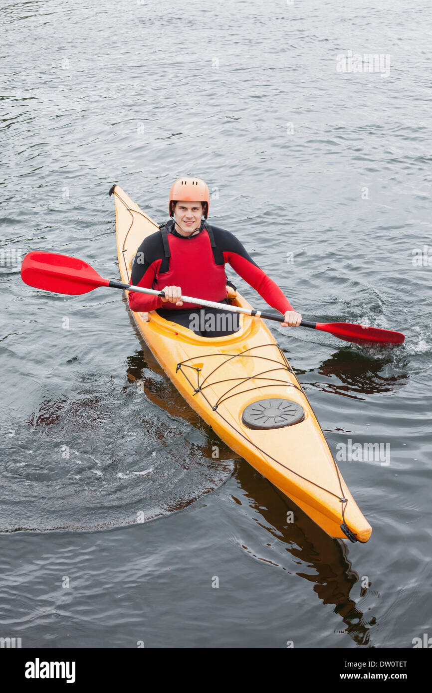 Happy man in a kayak Stock Photo - Alamy