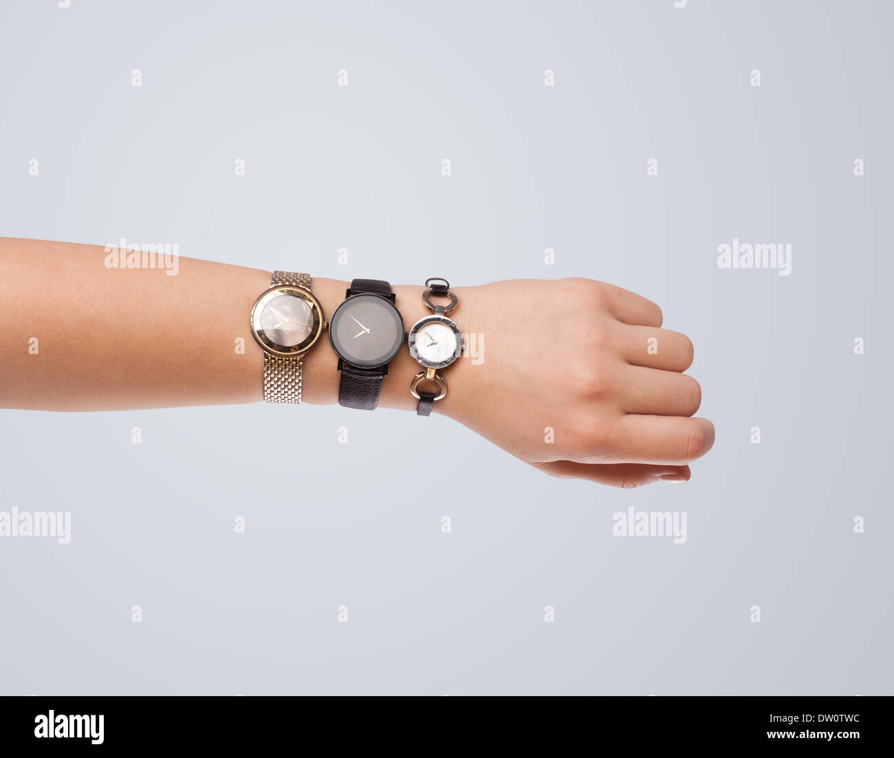 Hand with watch showing precise time Stock Photo - Alamy
