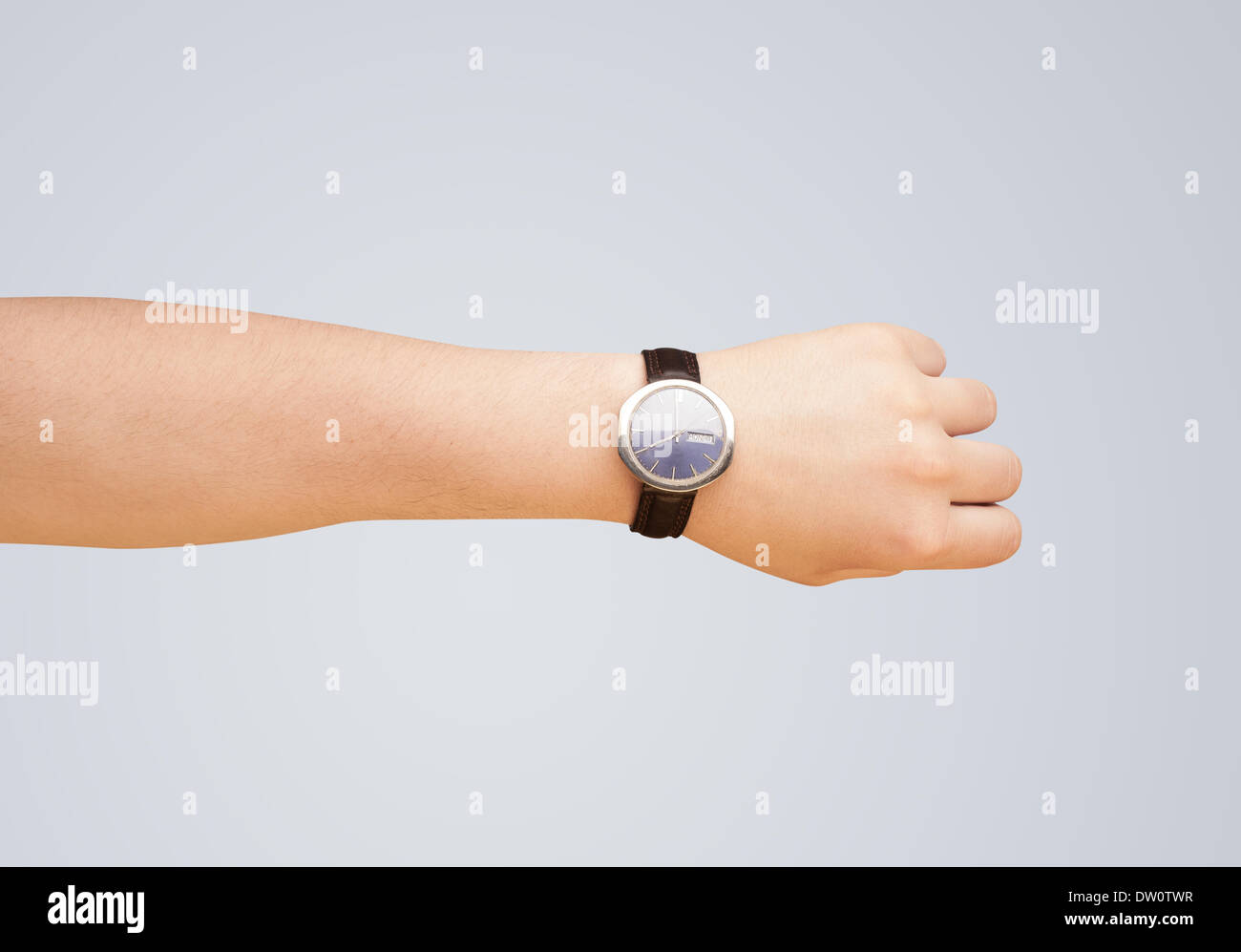 Hand with watch showing precise time Stock Photo - Alamy