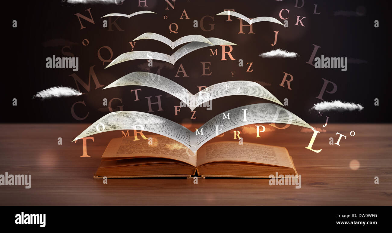 Open books glowing letters hi-res stock photography and images - Alamy