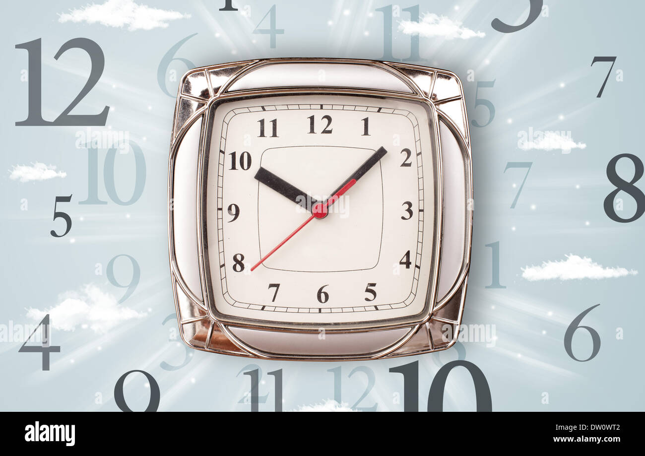 Modern clock with numbers on the side Stock Photo - Alamy