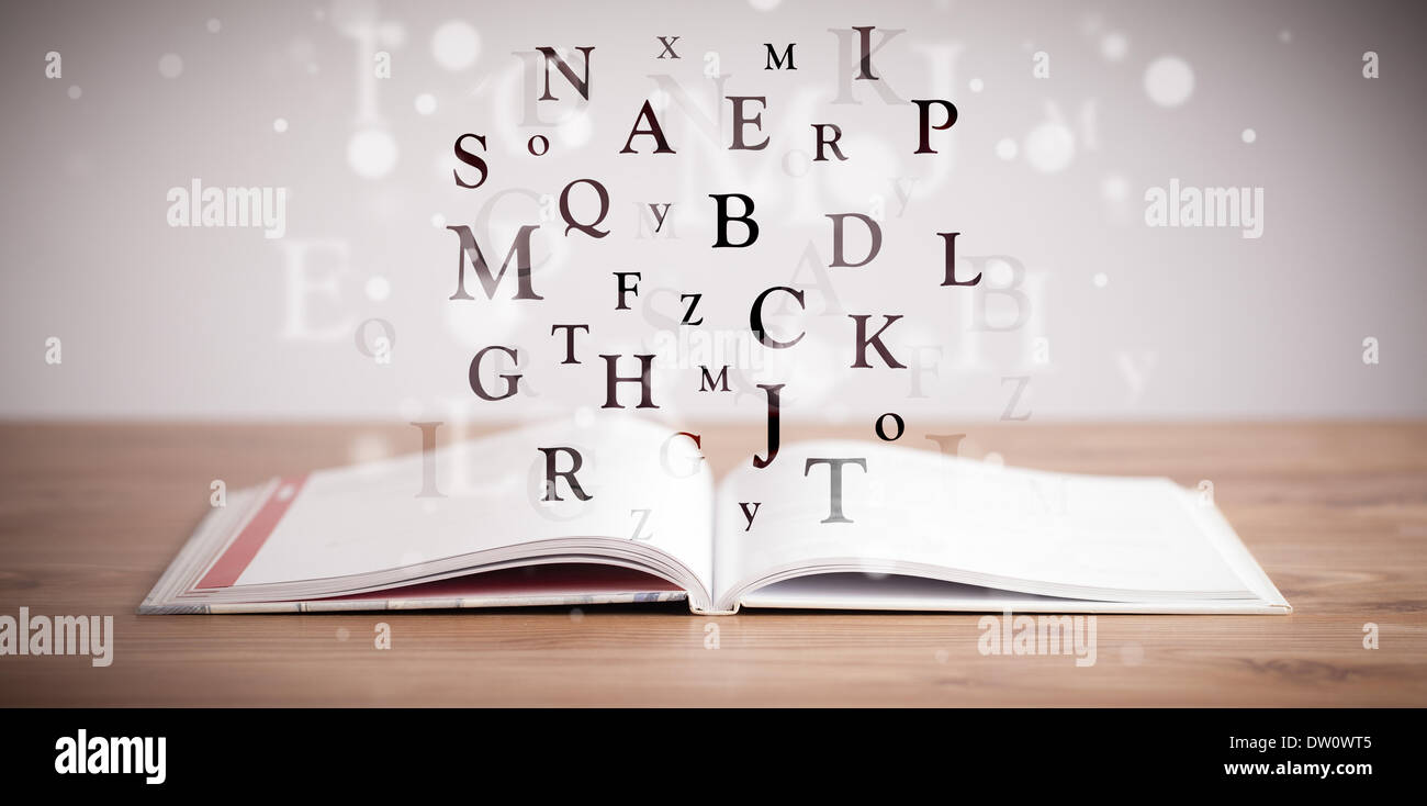 Open book flying alphabet hi-res stock photography and images - Alamy