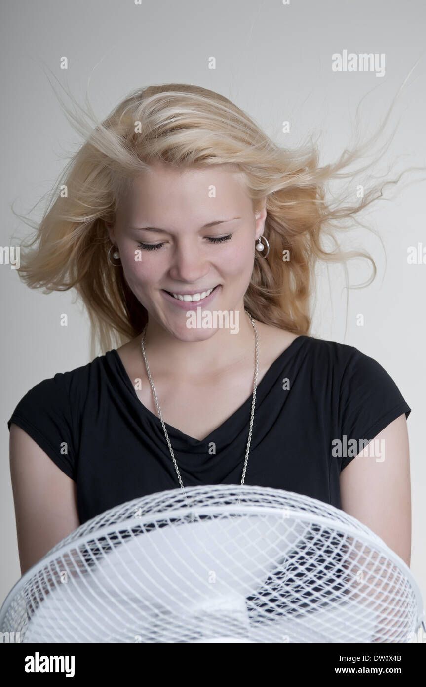 Fan blowing hair hi-res stock photography and images - Alamy