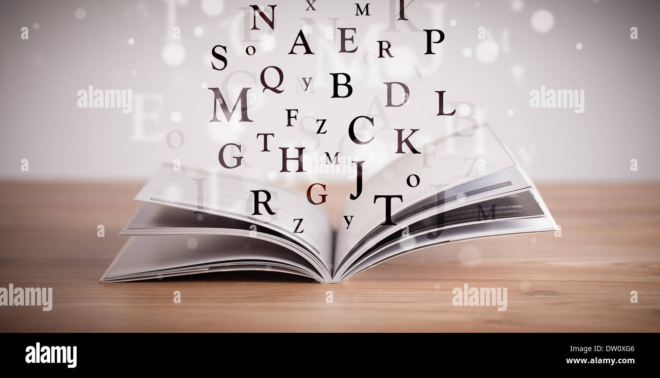 Open book flying alphabet hi-res stock photography and images - Alamy