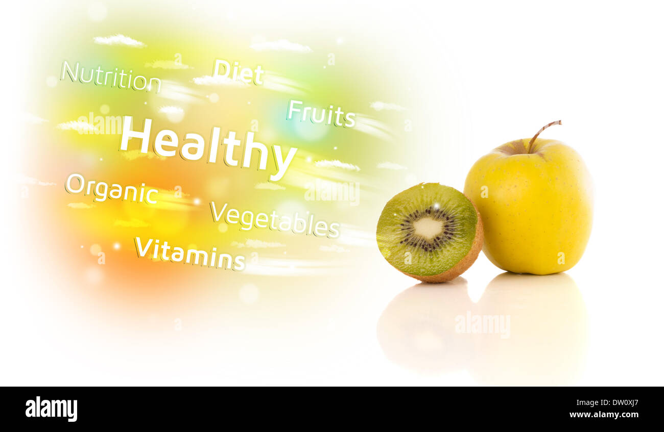 Colorful juicy fruits with healthy text and signs Stock Photo - Alamy