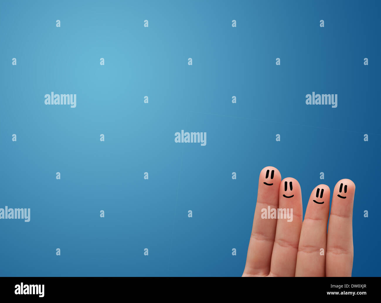 Happy smiley face fingers looking at empty blue background copy space ...