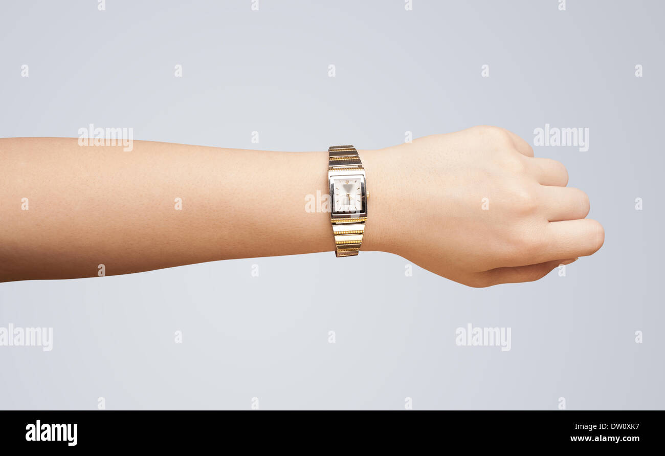 Hand with watch showing precise time Stock Photo - Alamy