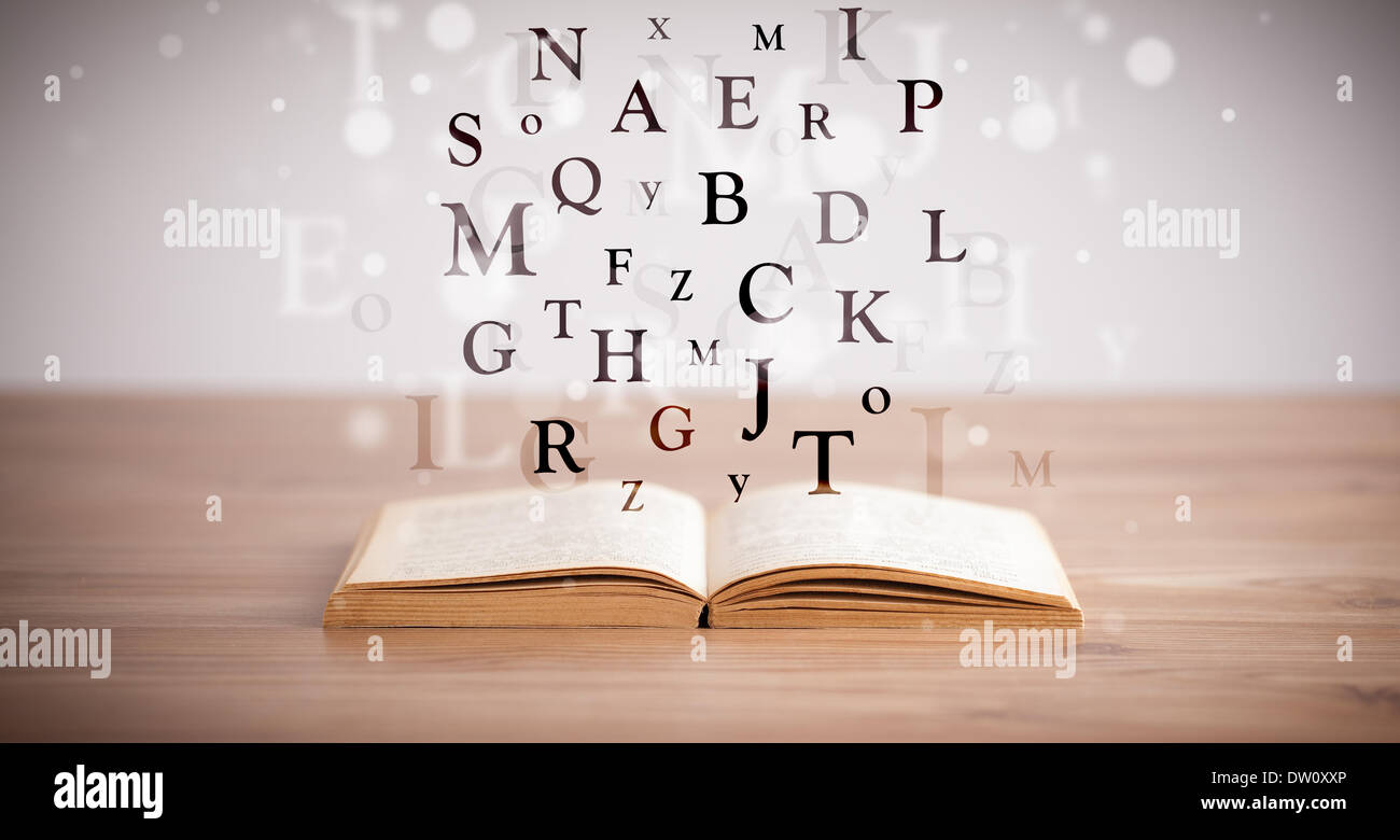Open book flying alphabet hi-res stock photography and images - Alamy