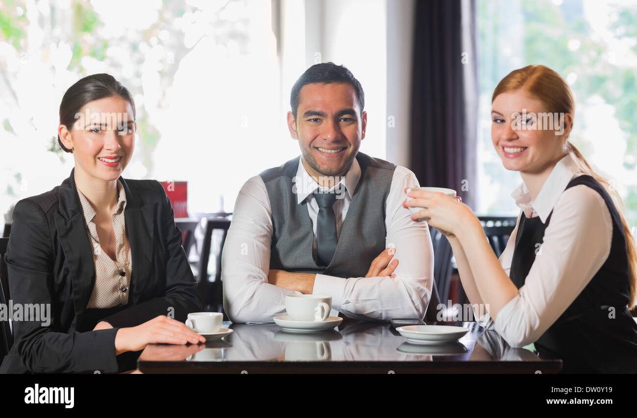 Stylish colleagues having coffee hi-res stock photography and images ...