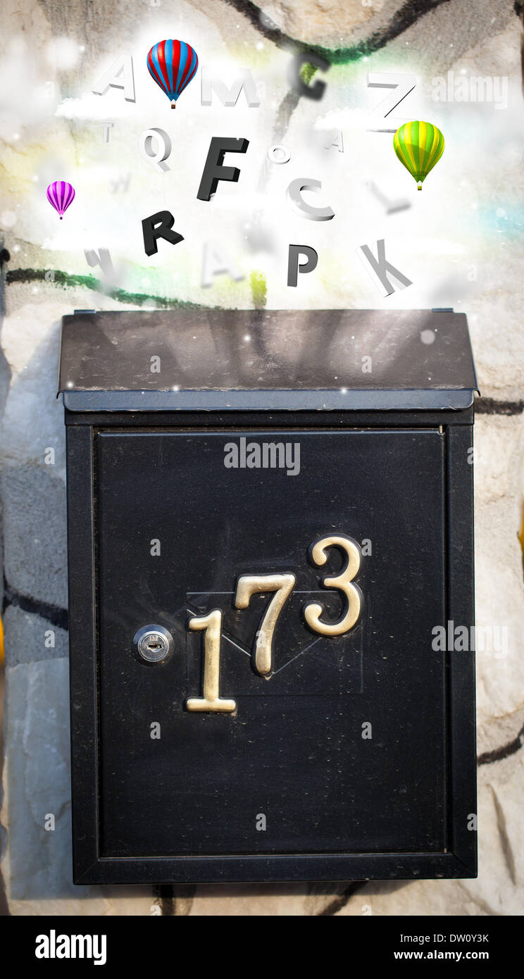 Post box with colorful letters Stock Photo - Alamy