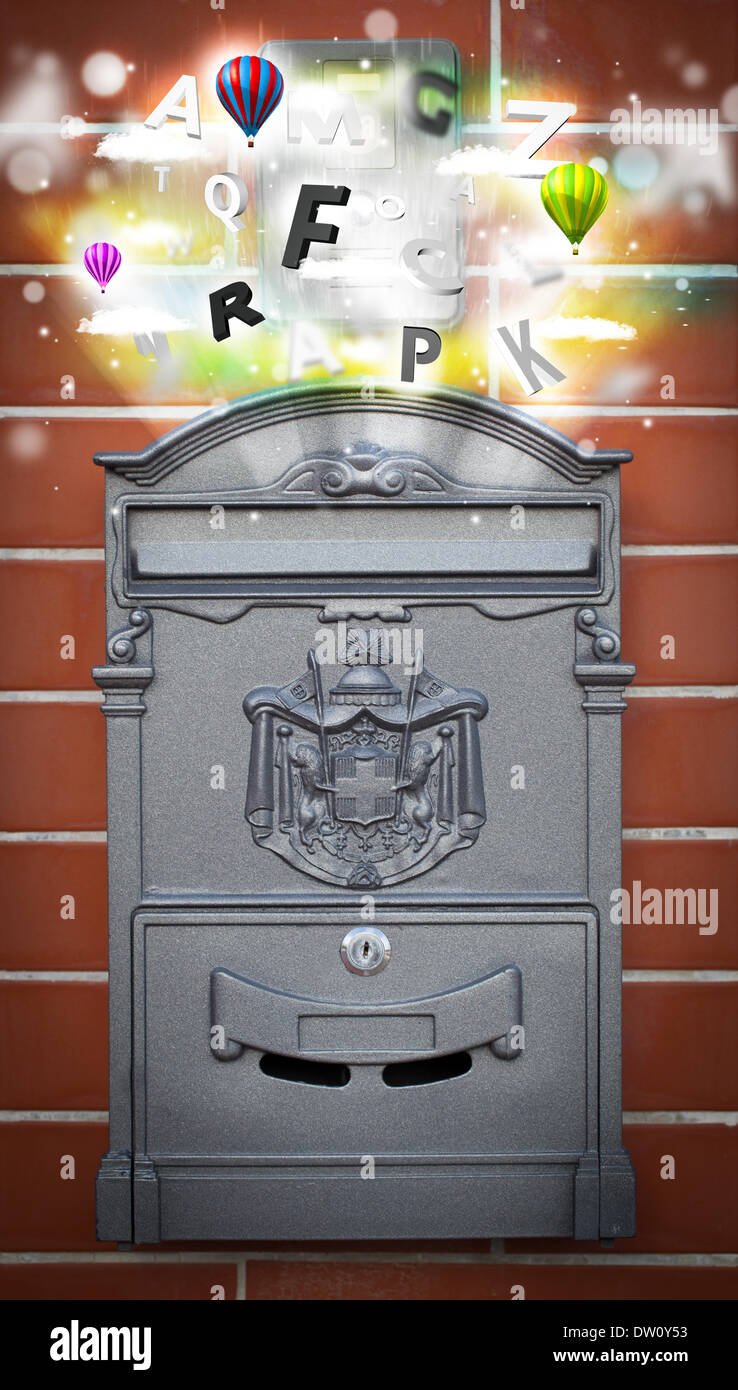 Post box with colorful letters Stock Photo - Alamy
