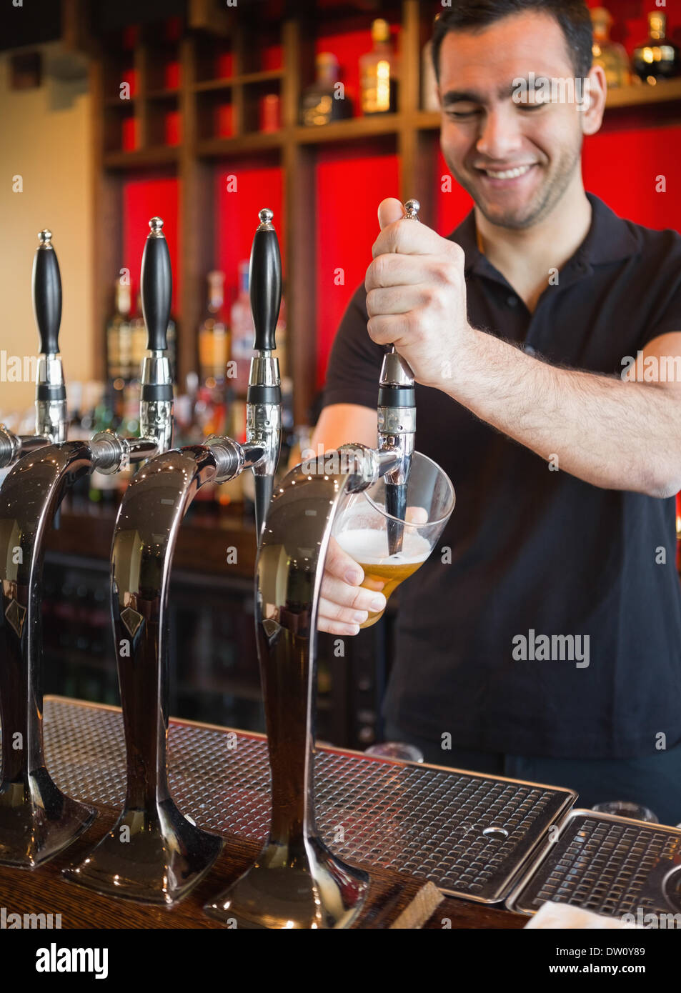 Pulling pint of lager hi-res stock photography and images - Alamy