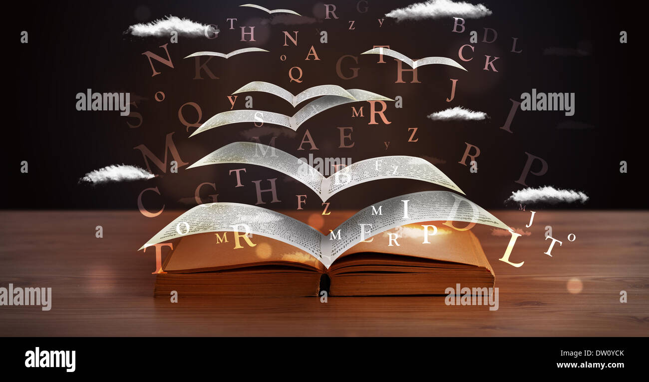 Pages and glowing letters flying out of a book Stock Photo - Alamy