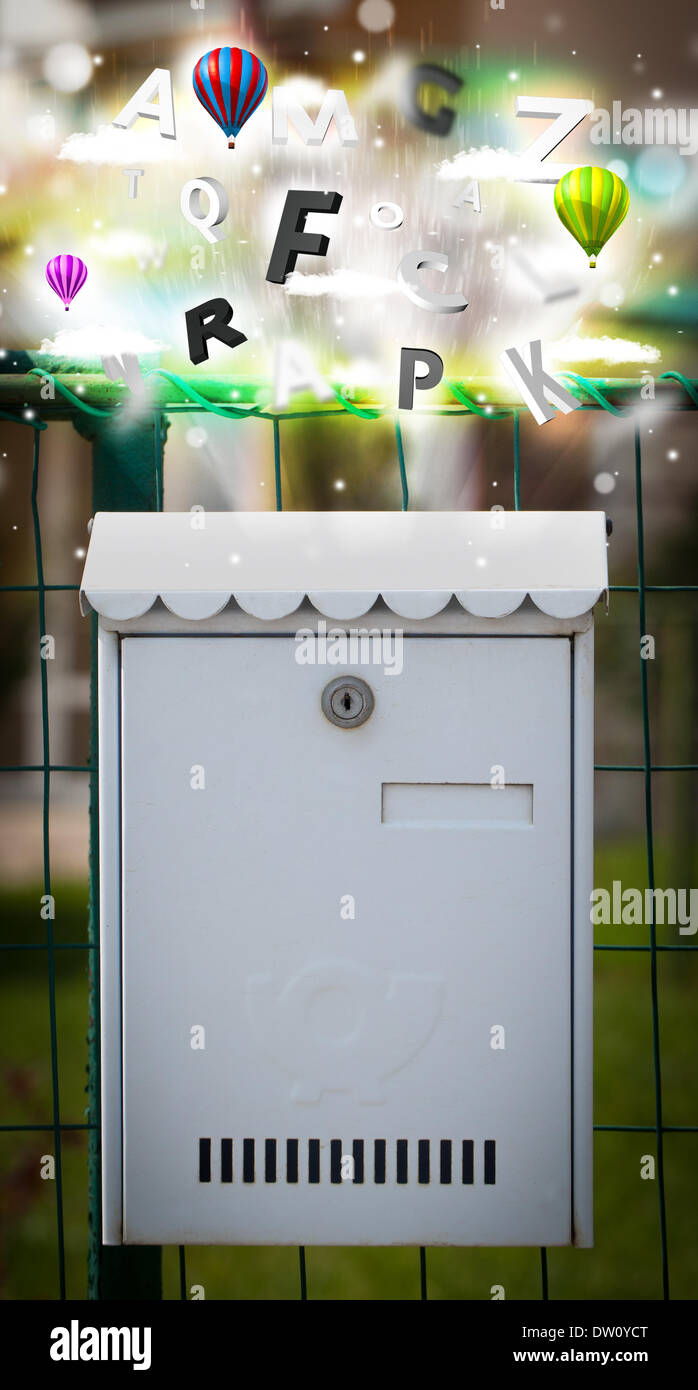 Post box with colorful letters Stock Photo - Alamy