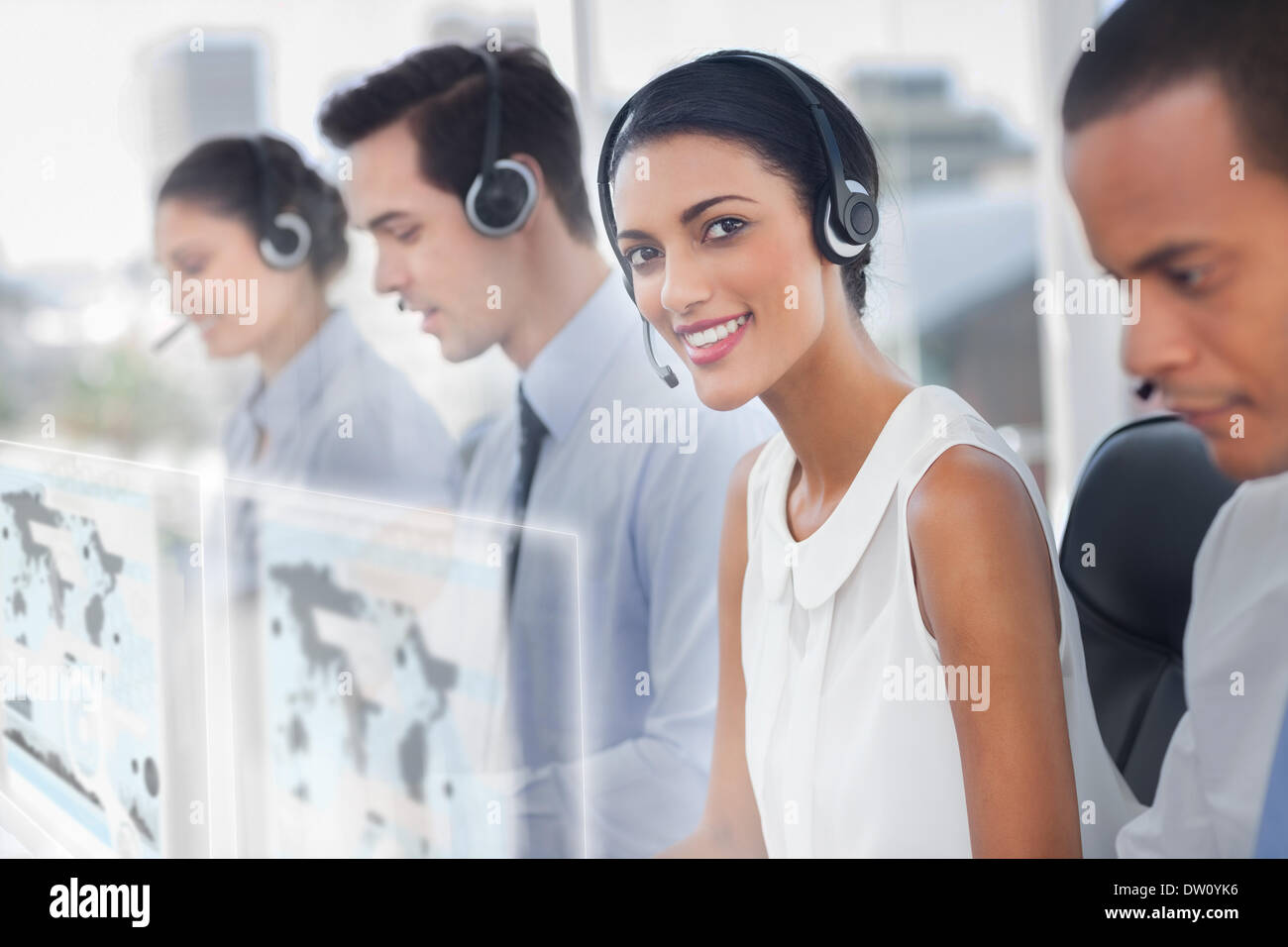 Smiling agent colleagues sitting hi-res stock photography and images ...