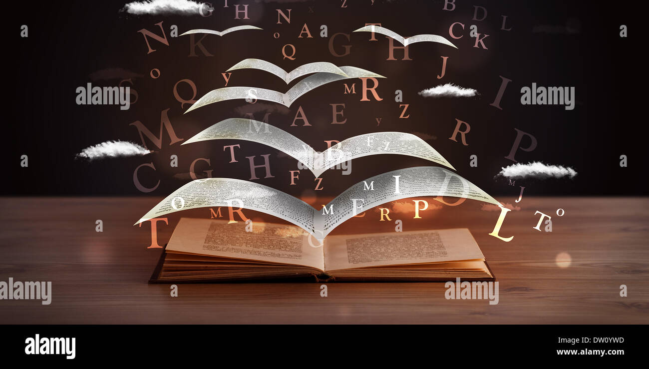 Open books glowing letters hi-res stock photography and images - Alamy