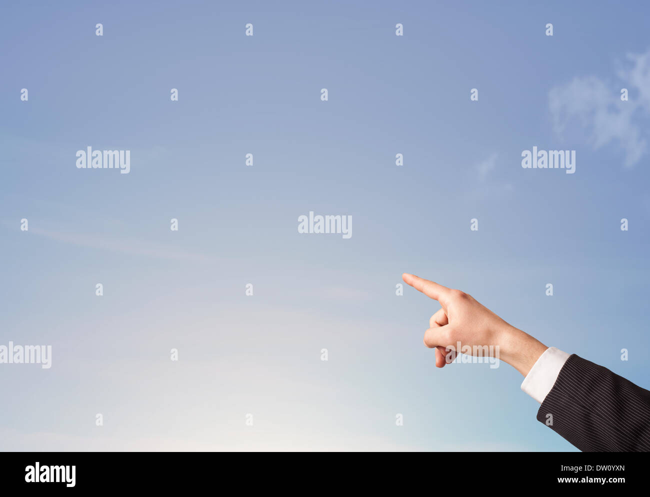 Hand aiming at at the blue sky copyspace Stock Photo - Alamy