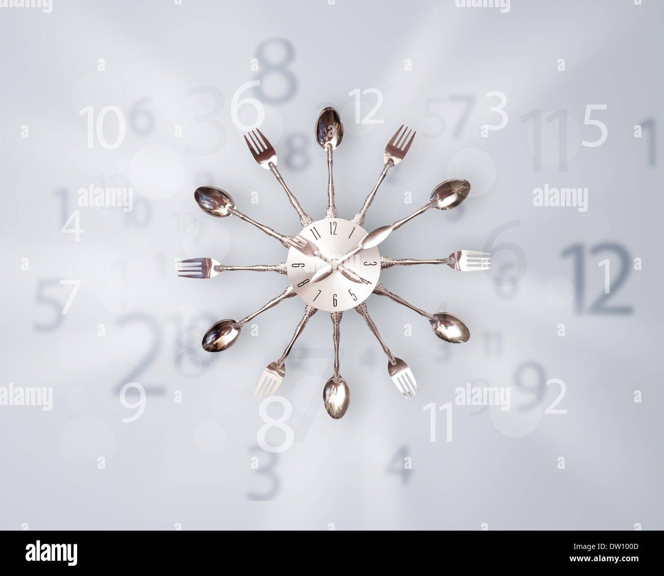 Modern clock with numbers comming out Stock Photo - Alamy