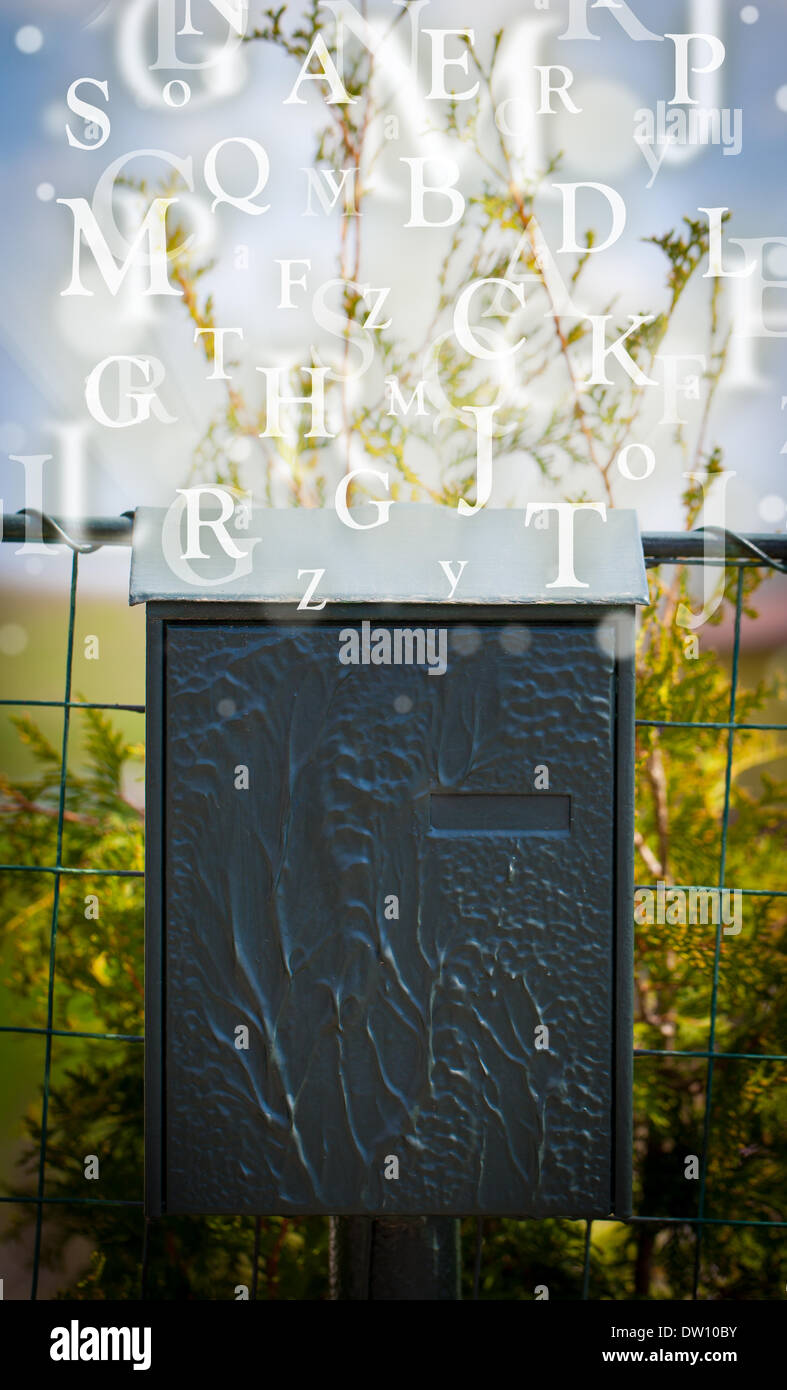Mail box with letters comming out Stock Photo - Alamy