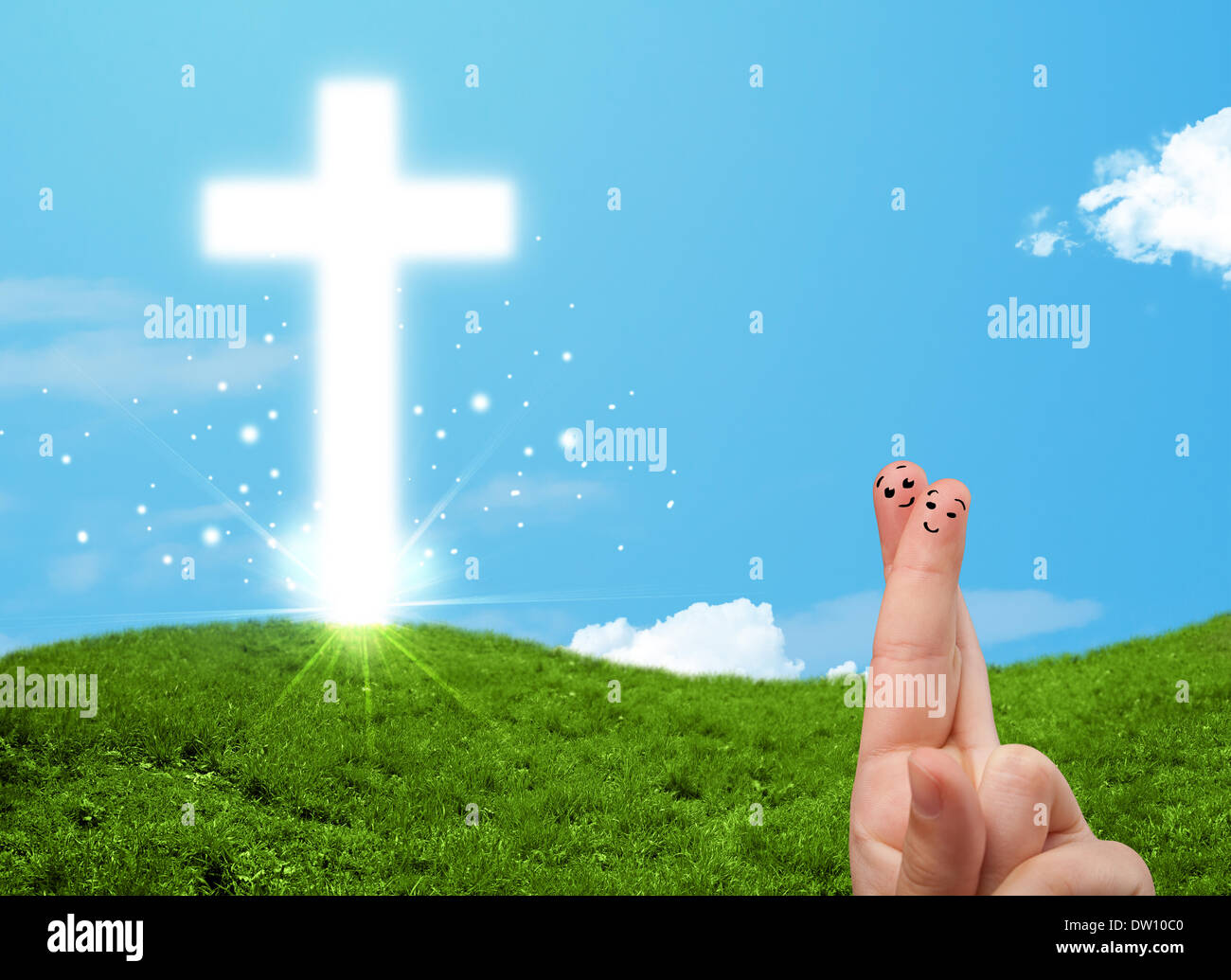 Happy finger smileys with christian religion cross Stock Photo - Alamy