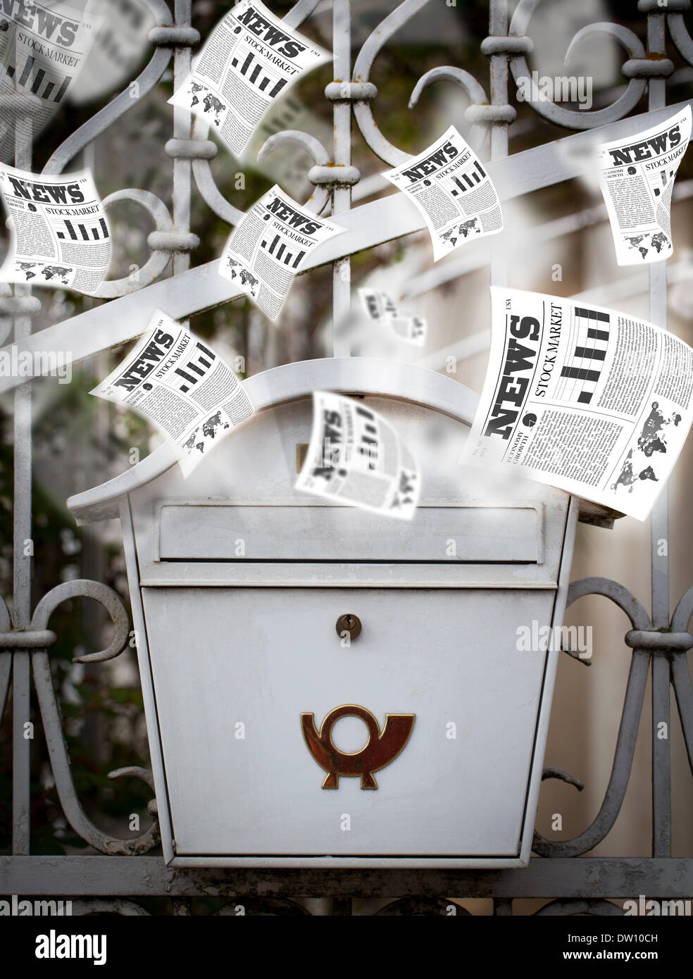 Post box with daily newspapers flying Stock Photo - Alamy