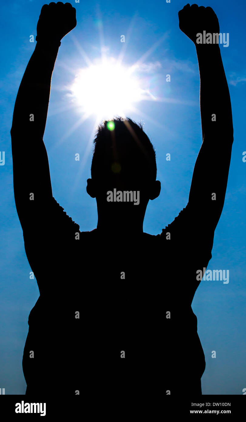 silhouette of man victory and happy Stock Photo - Alamy