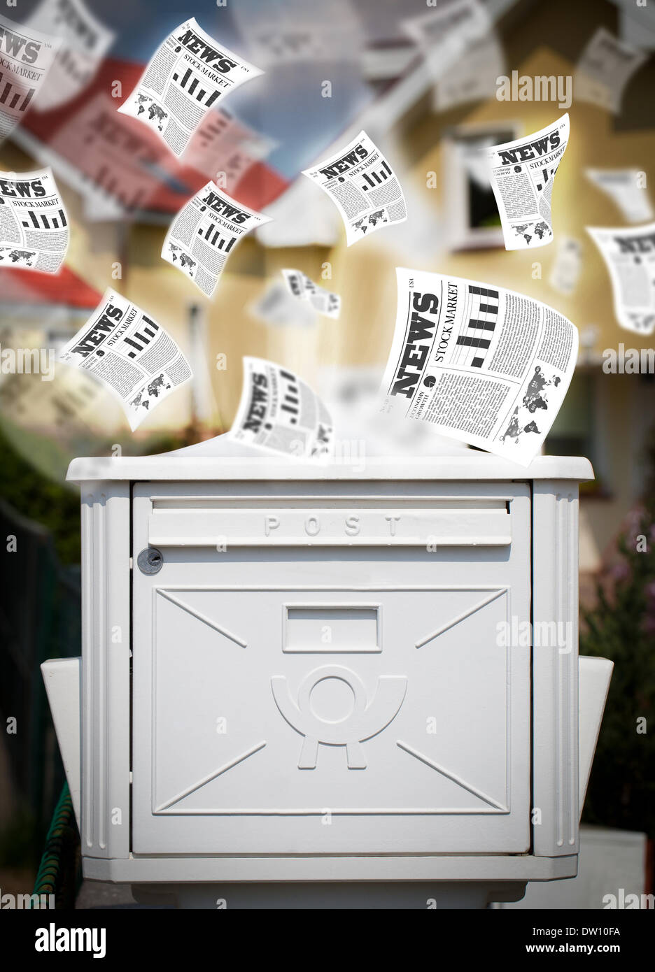 Post box with daily newspapers flying Stock Photo - Alamy