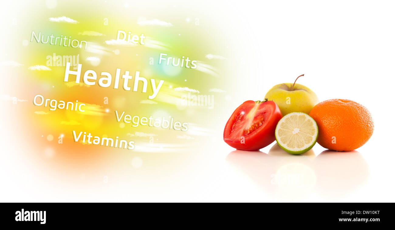 Colorful juicy fruits with healthy text and signs Stock Photo - Alamy