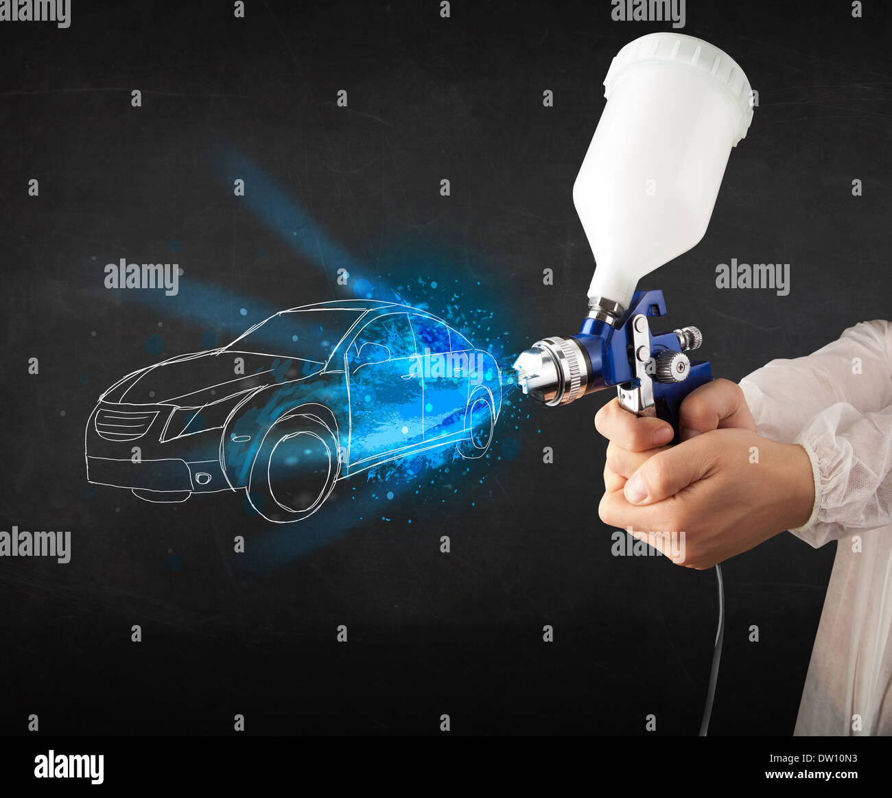 Worker with airbrush gun painting hand drawn car lines Stock Photo - Alamy