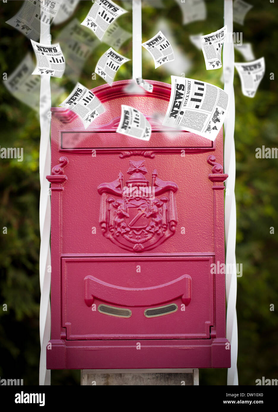 Post box with daily newspapers flying Stock Photo - Alamy