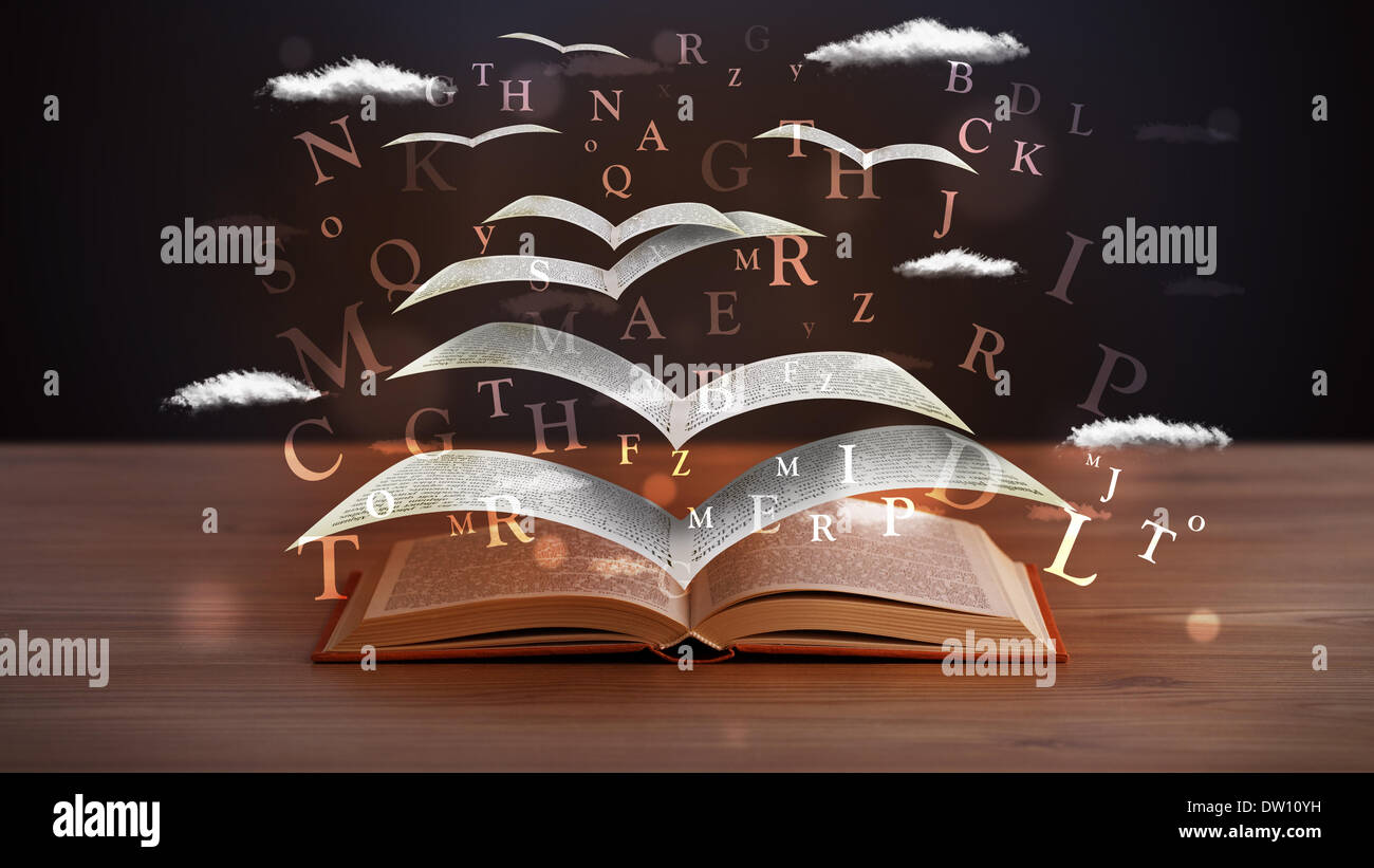 Pages and glowing letters flying out of a book Stock Photo - Alamy