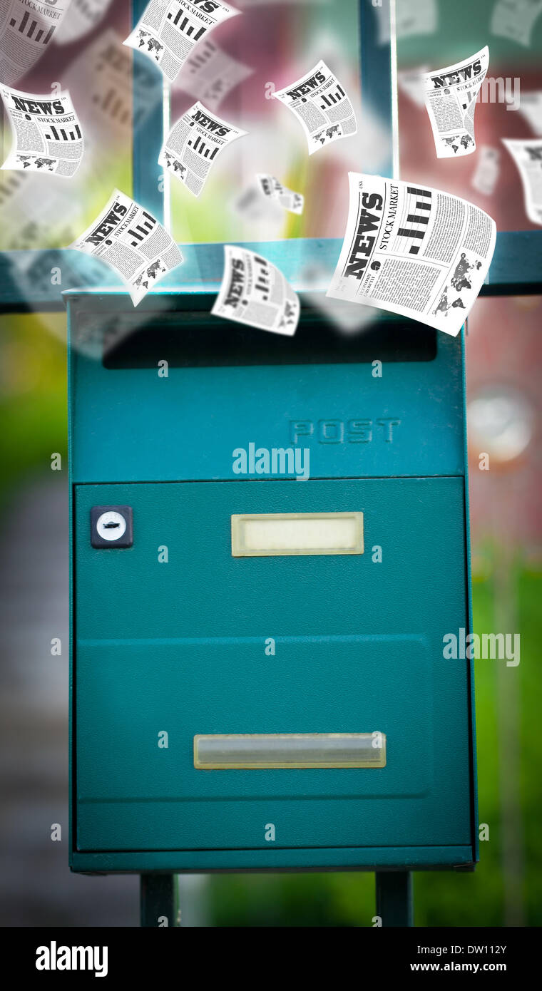 Post box with daily newspapers flying Stock Photo - Alamy